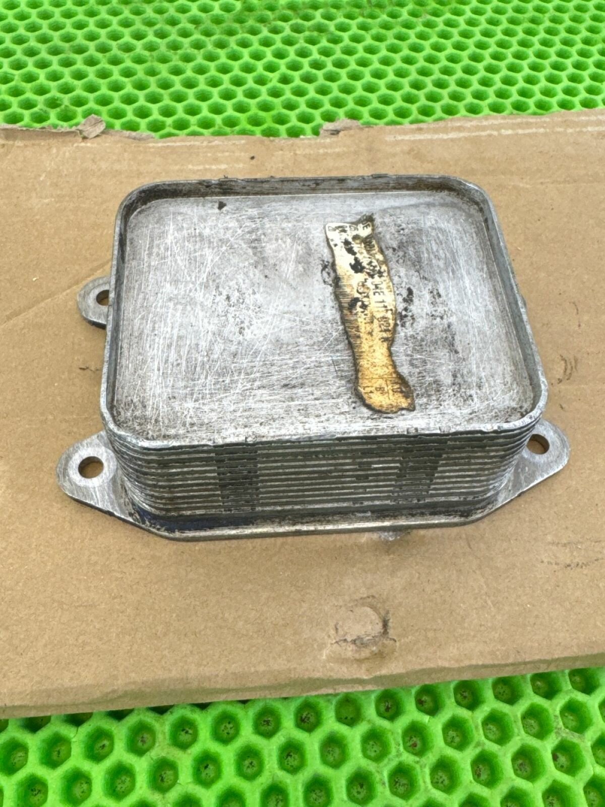 Теплообменник масляного фильтра Volkswagen Golf Mk7 (2012—2017) AW04E01170021C