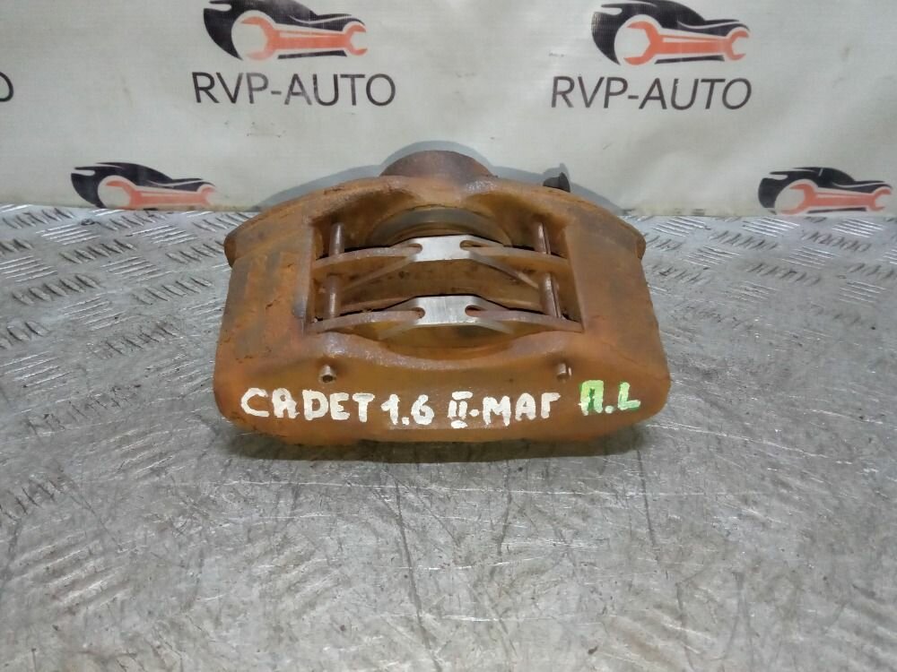 Суппорт передний левый Opel Kadett E 1.6 1989-93 Opel