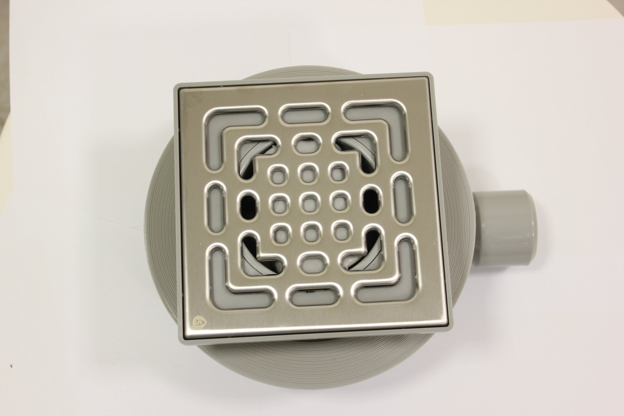 Трап TST регулир. с сухим затвором с горизонтальным (угловым) выпуском 50 10см*10см