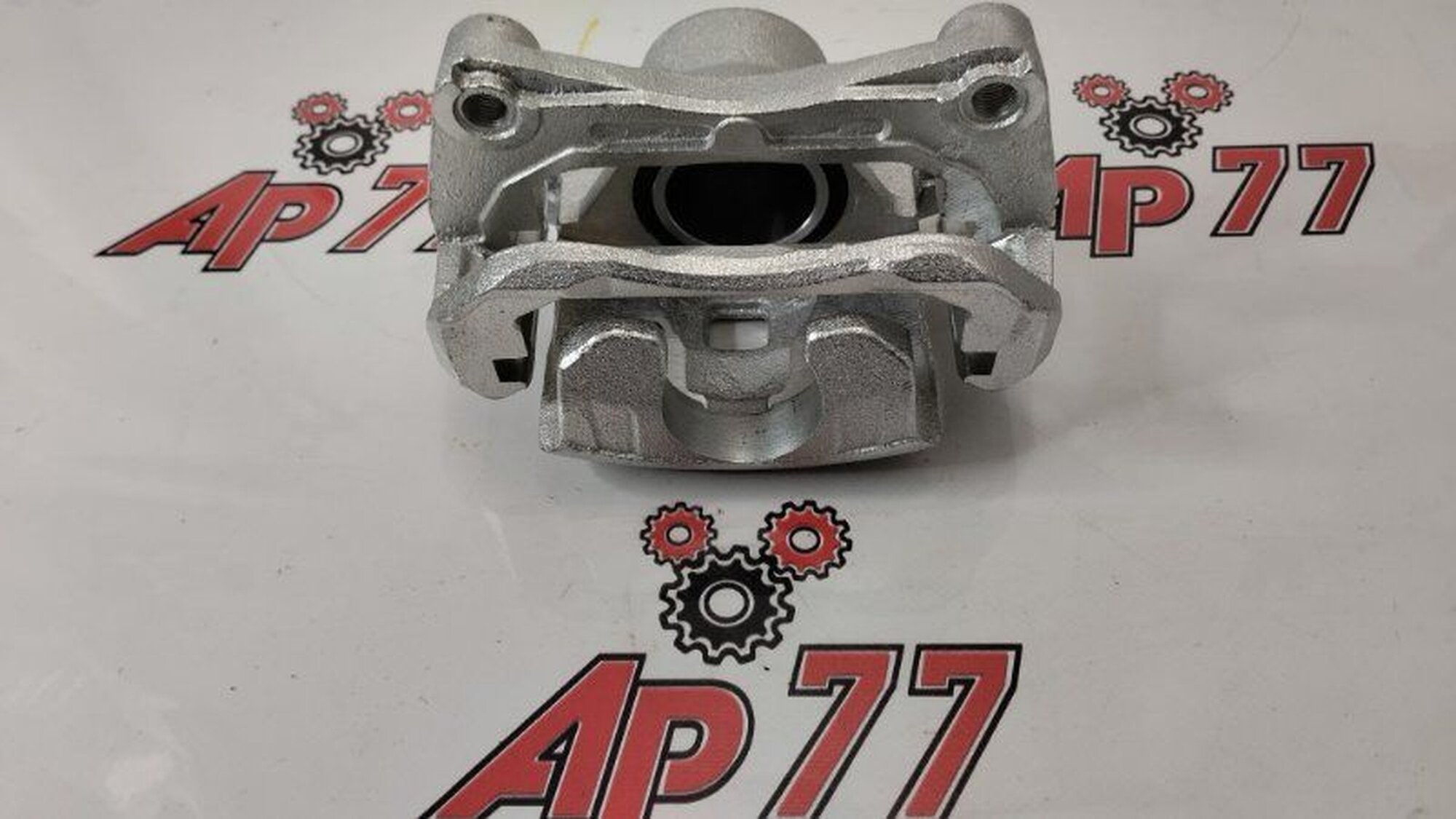 Суппорт Nissan Datsun AMD21 FR 1 поршневой 4100109W00 передний правый