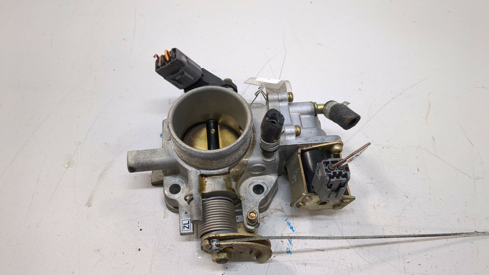 Заслонка дроссельная Mazda 323 (BJ) Б/У