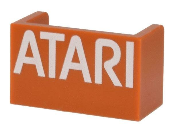 Деталь Lego 23969pb008 Panel 1 x 2 x 1 with Rounded Corners and 2 Sides with White 'ATARI' Pattern