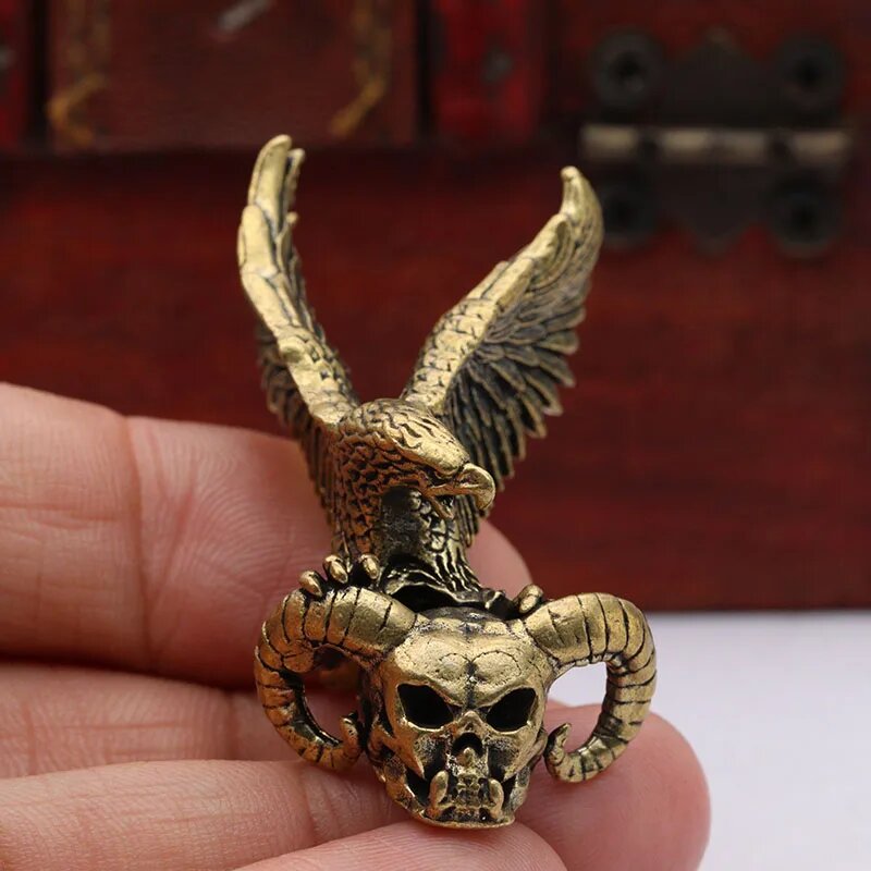 Статуэтка из латуни орел козьи рога череп