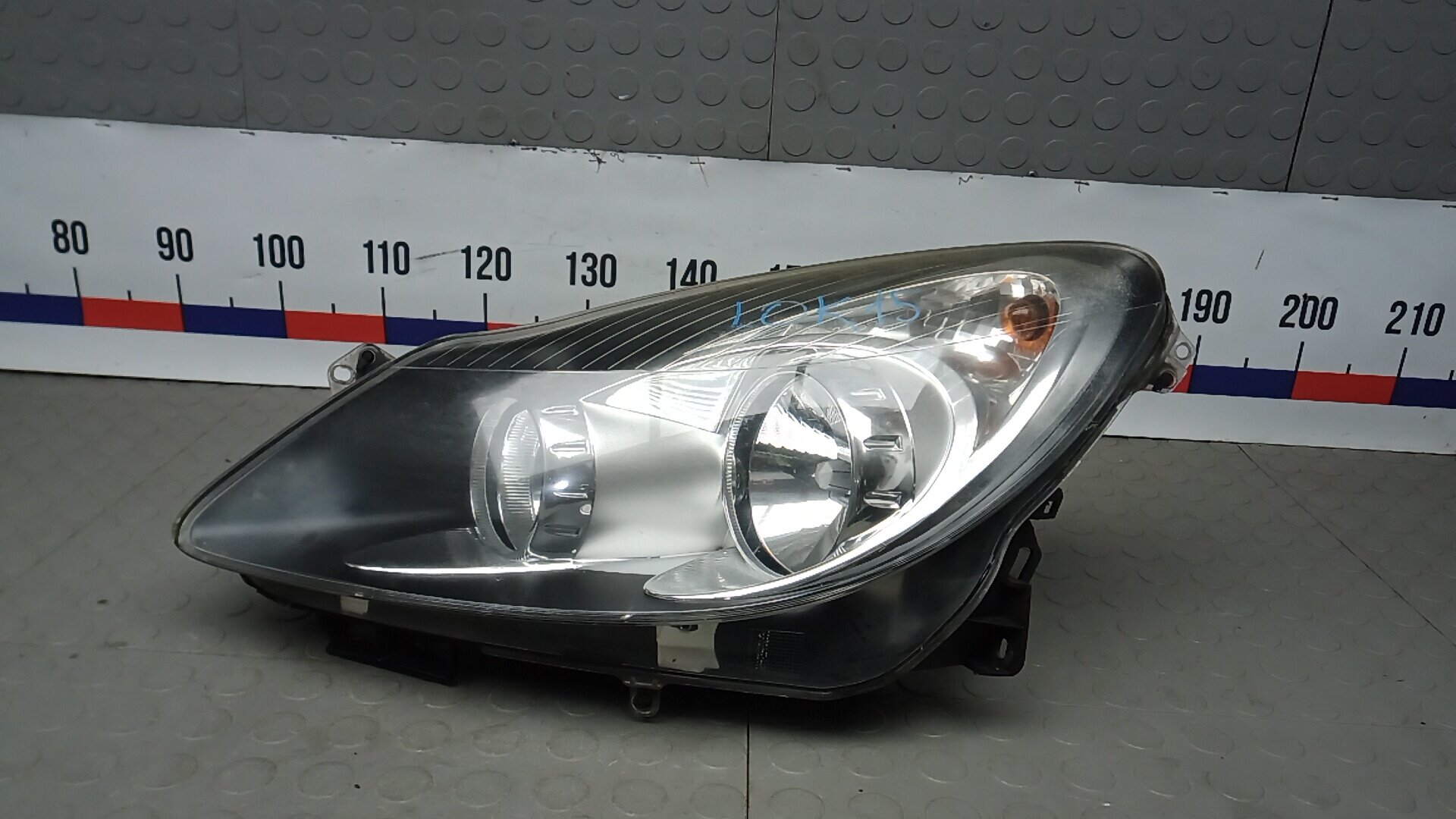 Фара левая OPEL CORSA D