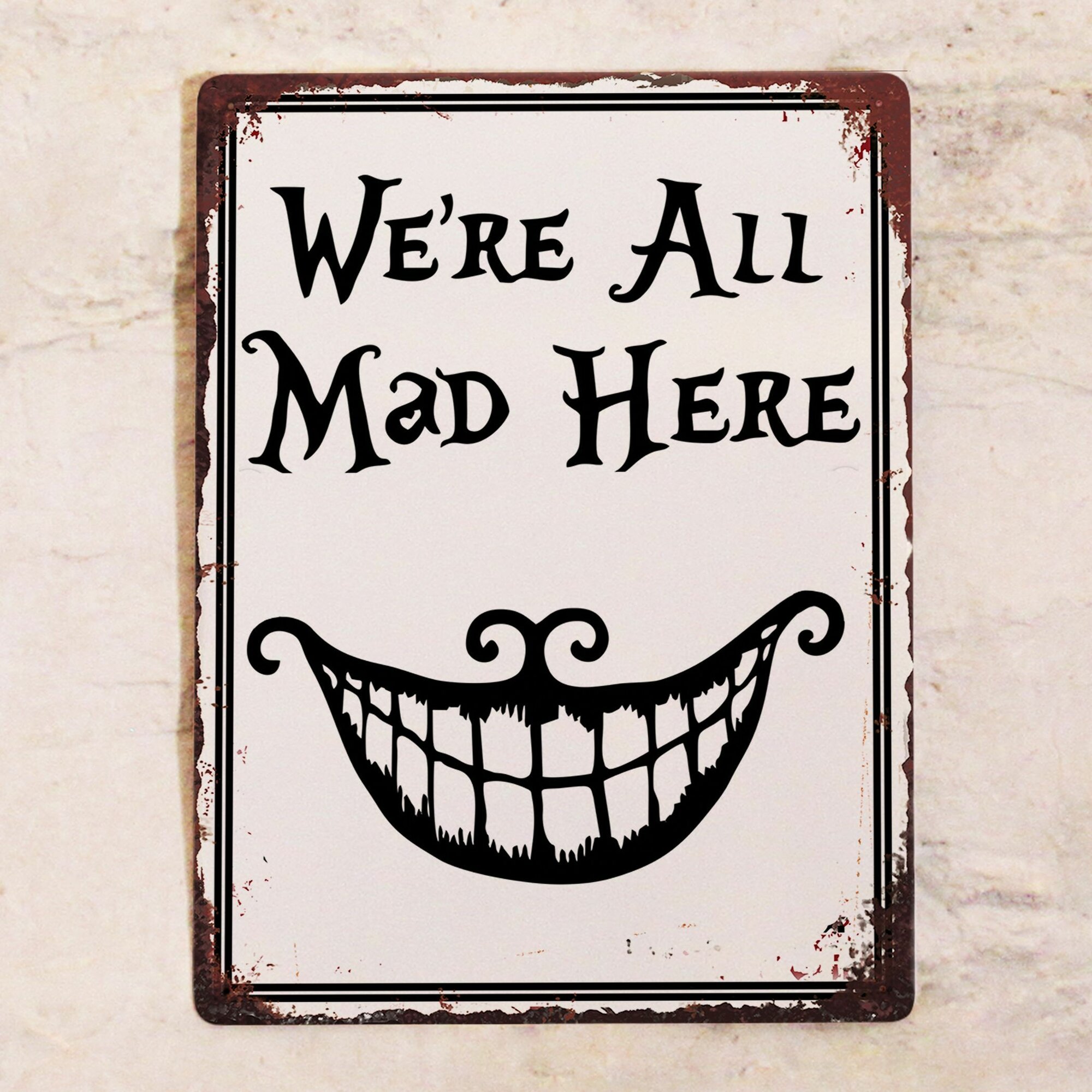 Прикольная табличка we are all mad here с улыбкой Чеширского кота из Алисы в стране чудес, металл, 20х30 см.