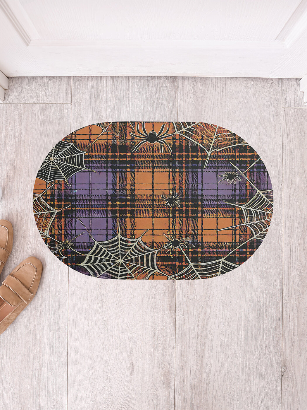Коврик овальный в прихожую "Ужасающая клетка" 58x38 см, JoyArty