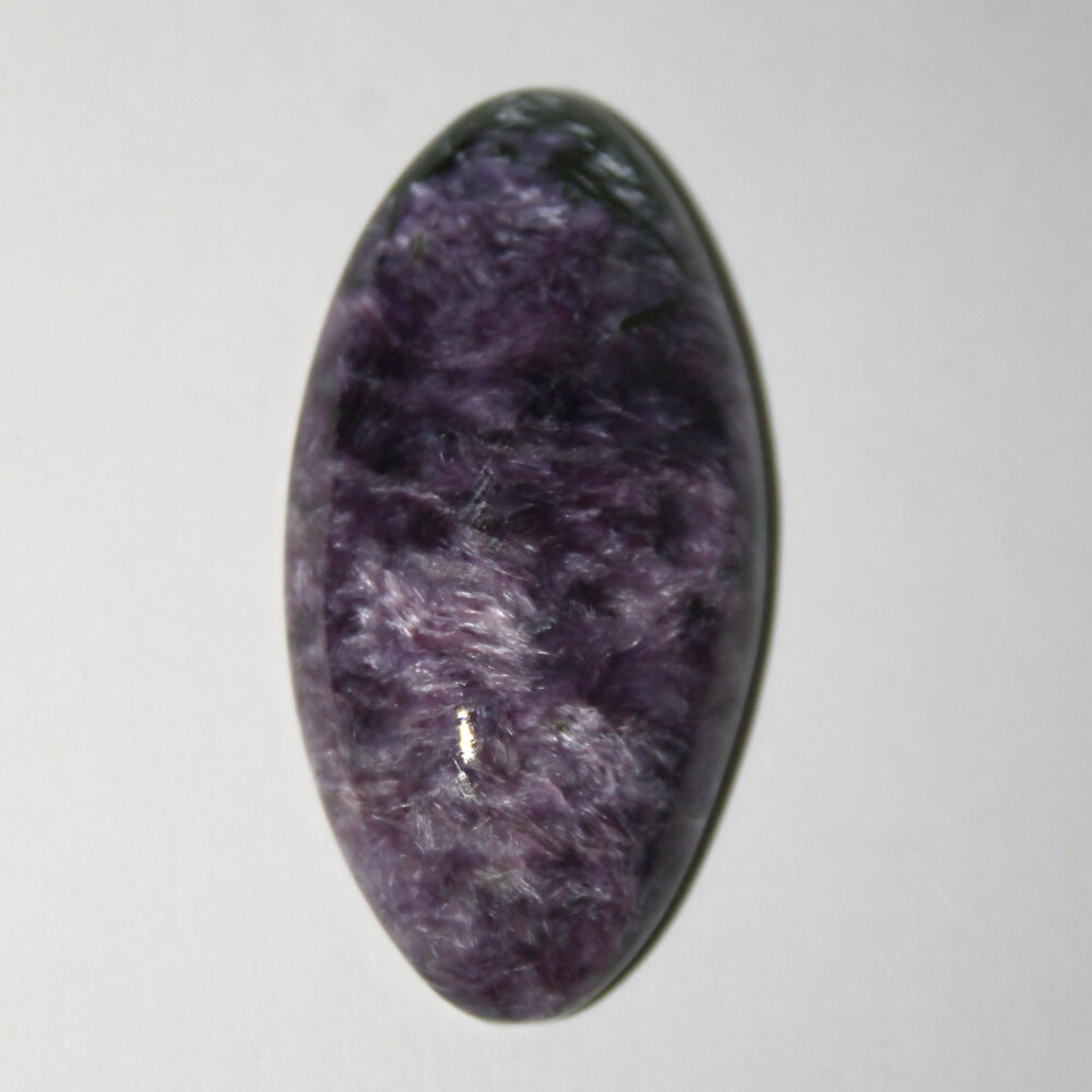 Чароит кабошон, натуральный камень, 41х20х4 мм, Якутия,"True Stones"