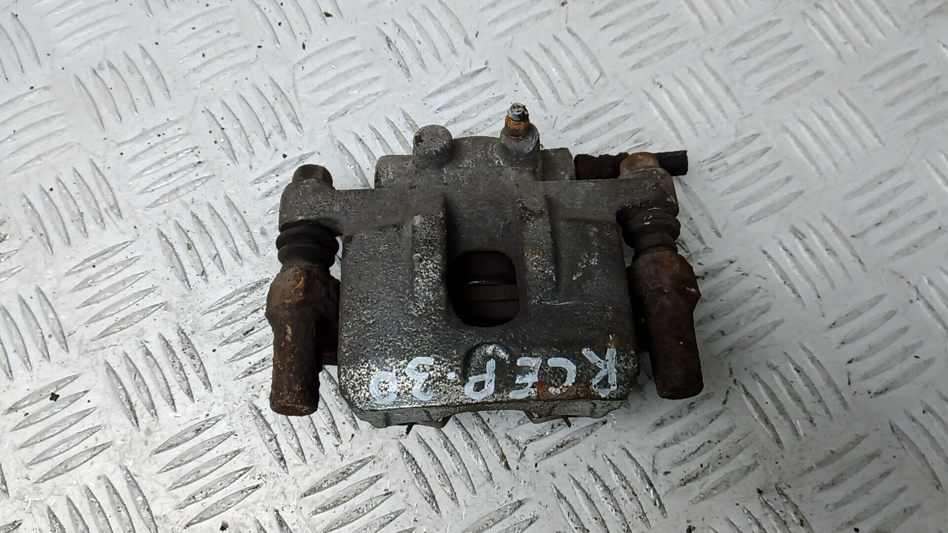 Суппорт тормозной задний правый MITSUBISHI LANCER 10