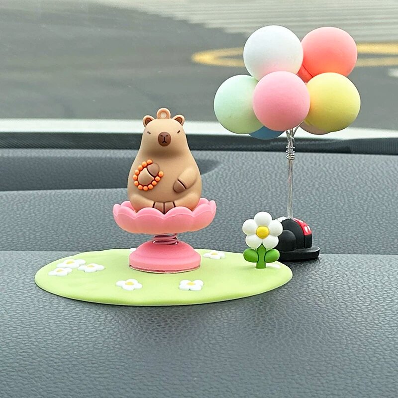 Капибара-игрушка-качалка для автомобильной панели с +1, воздушным шаром и зелёной цветочной подушкой