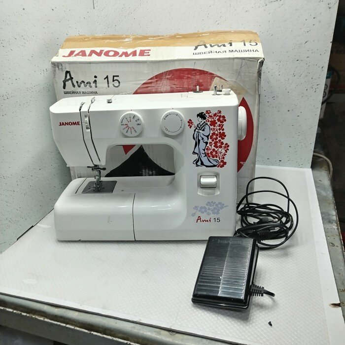 Швейная машина Janome AMI 15