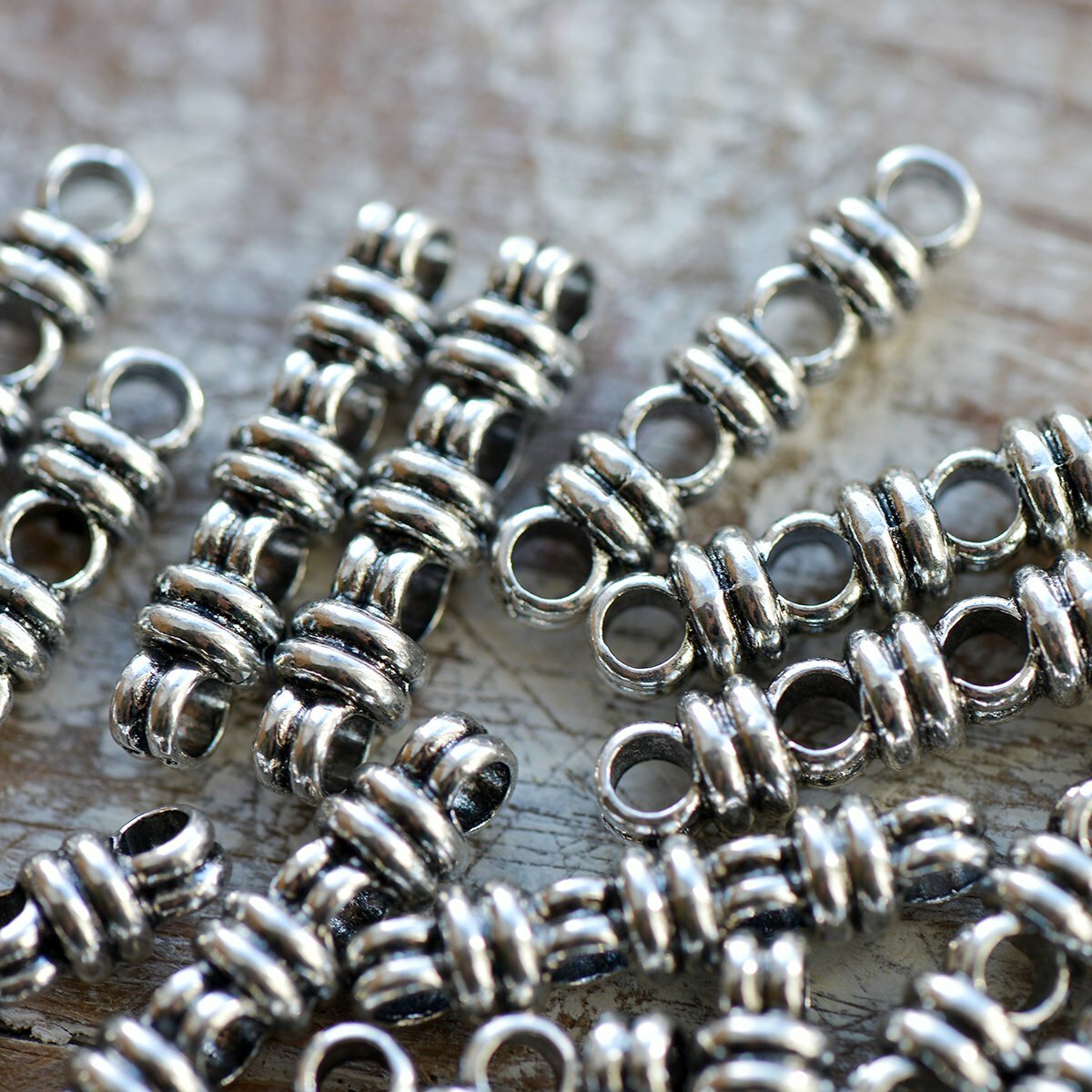 Разделитель 4-отв. для бусин (уп 15 шт) / спейсер, цвет античное серебро, 27х6.5x6.5 мм