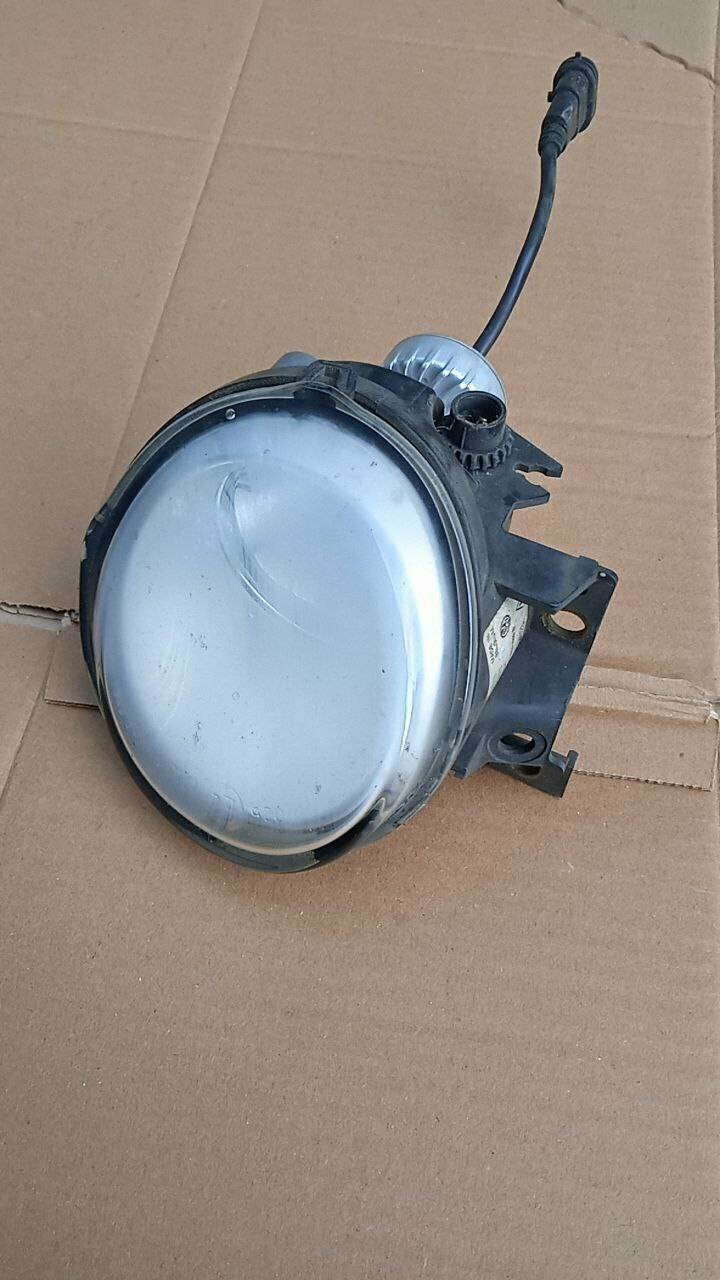 Фара противотуманная левая Volkswagen Touareg (2002 - 2007) 7L6941699B