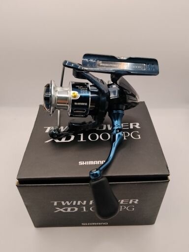 Катушка Shimano Twin Power XD 1000PG надежность, мощность и плавный ход.