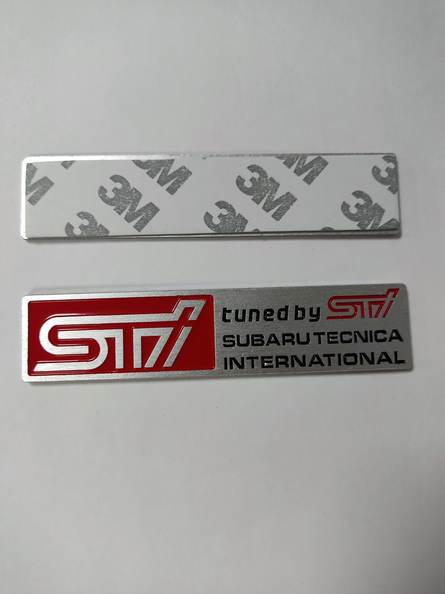 Шильдик "STI" для Subaru, металл, красный, глянцевый, самоклеящийся, 2.5см х 11 см