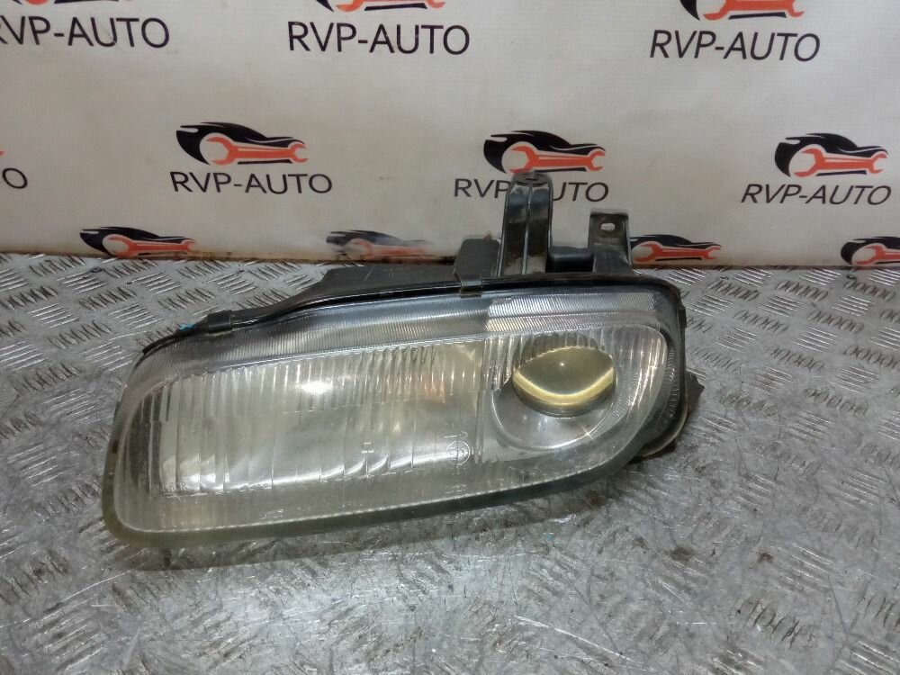 Фара левая Mazda 323 BW 1986-1987 8FBP51040