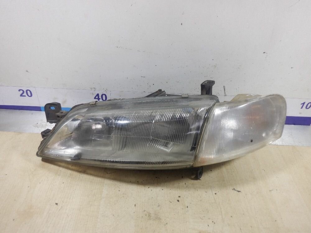 Фара левая Opel Vectra B 24417250