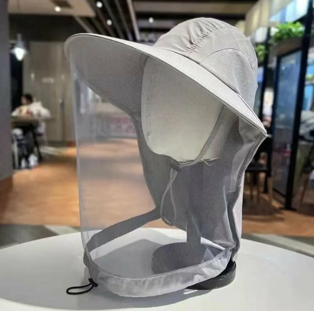 Москитные сетки на голове. Москитная сетка, включая солнцезащитную шапочку, светло-серая