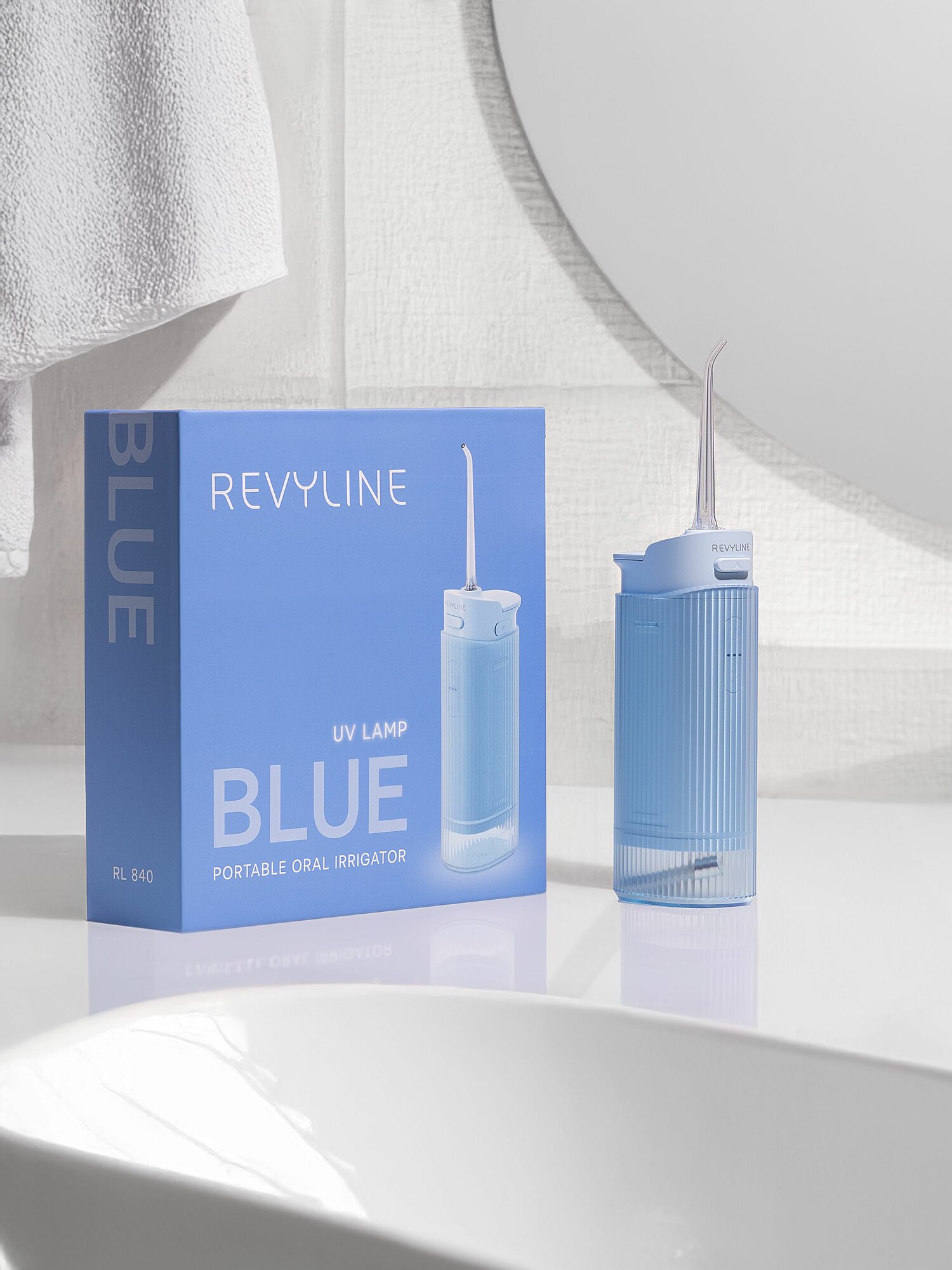 Ирригатор для полости рта Revyline RL 840 UV Lamp, портативный, синий