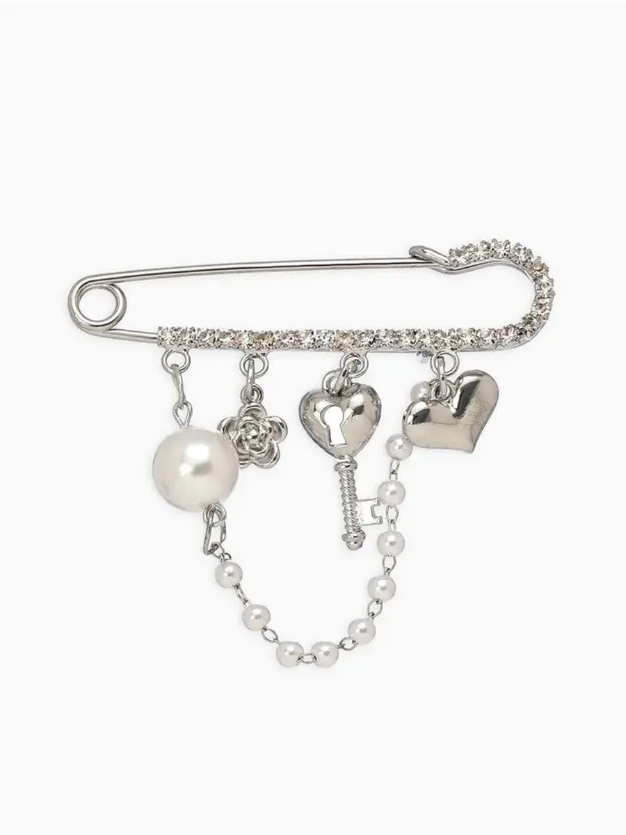 Изящная булавка с ключиком — символ любви и красоты