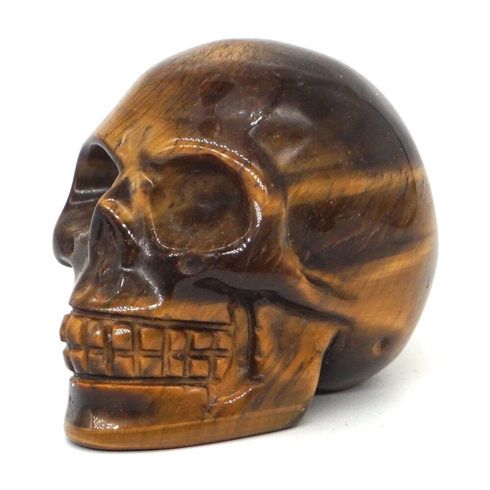 Резная статуэтка черепа из натурального камня Yellow Tiger Eye
