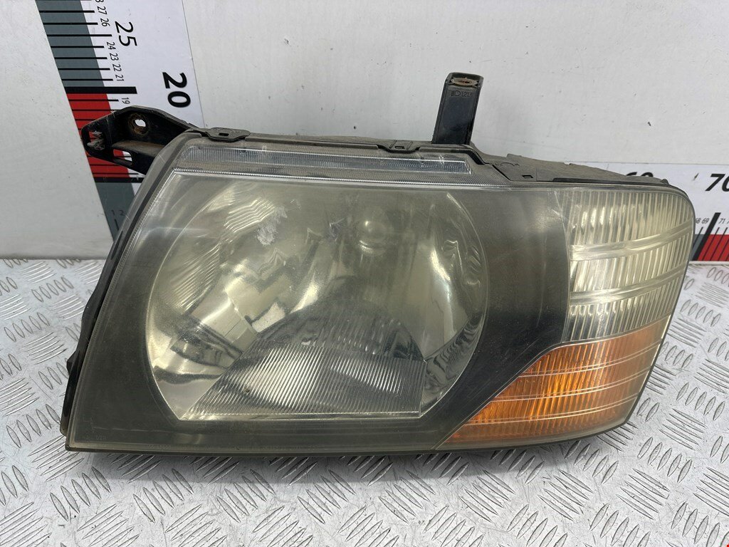 Фара левая Mitsubishi Pajero 3 MR598119 арт. 2241513