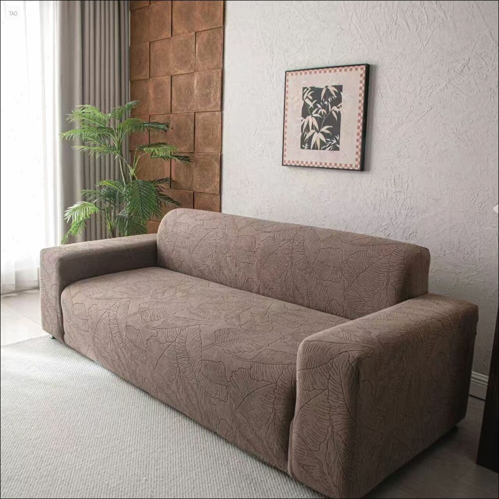 Чехол на диван трехместный с подлокотниками универсальный Joy.Yolife размер дивана 195-230 см, на резинке, с узором листьев 1 шт. Коричневый