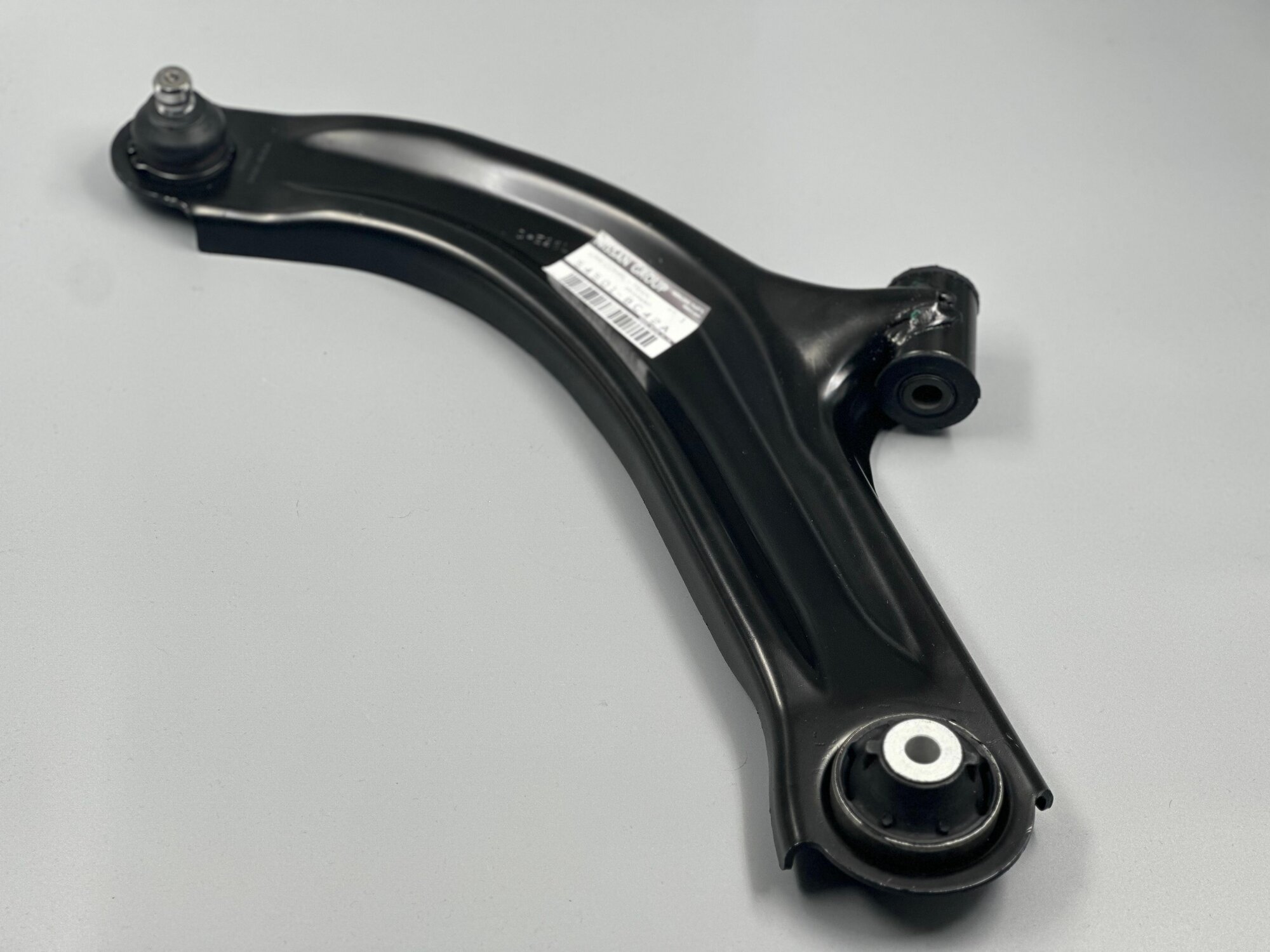 54501BC42A Оригинальный рычаг левый нижний Nissan Micra, Note