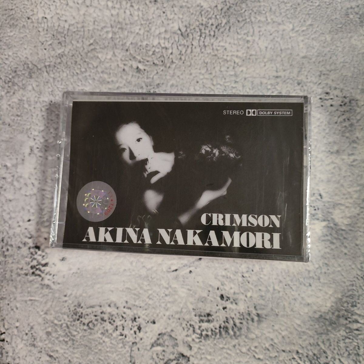 Аудиокассета Акина Накамори — альбом Crimson (ремастер) в чёрном корпусе, хиты Mine и 駅, новая, запечатана, подарок