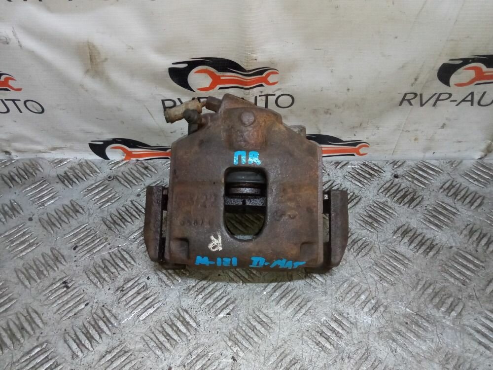 Суппорт передний правый Mazda 121 1996—2003