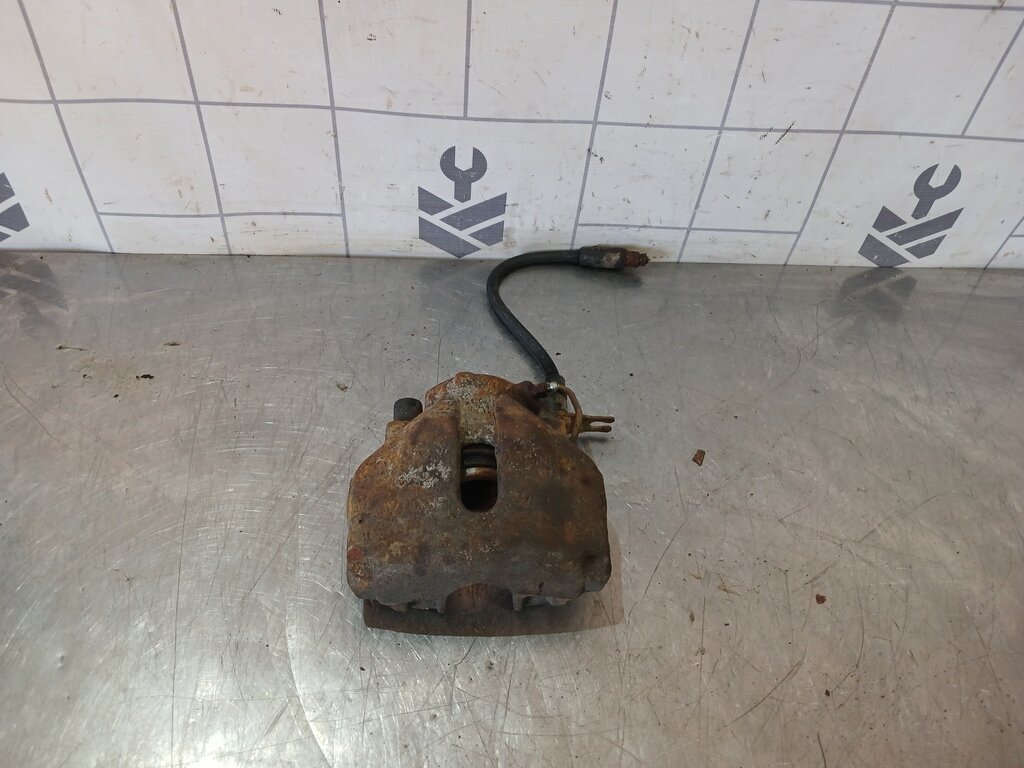 Суппорт передний правый VW Passat B5 96-00