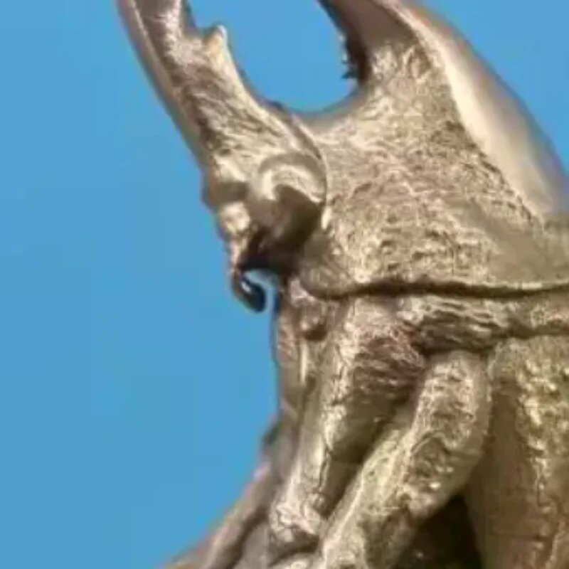 Медная статуэтка жука