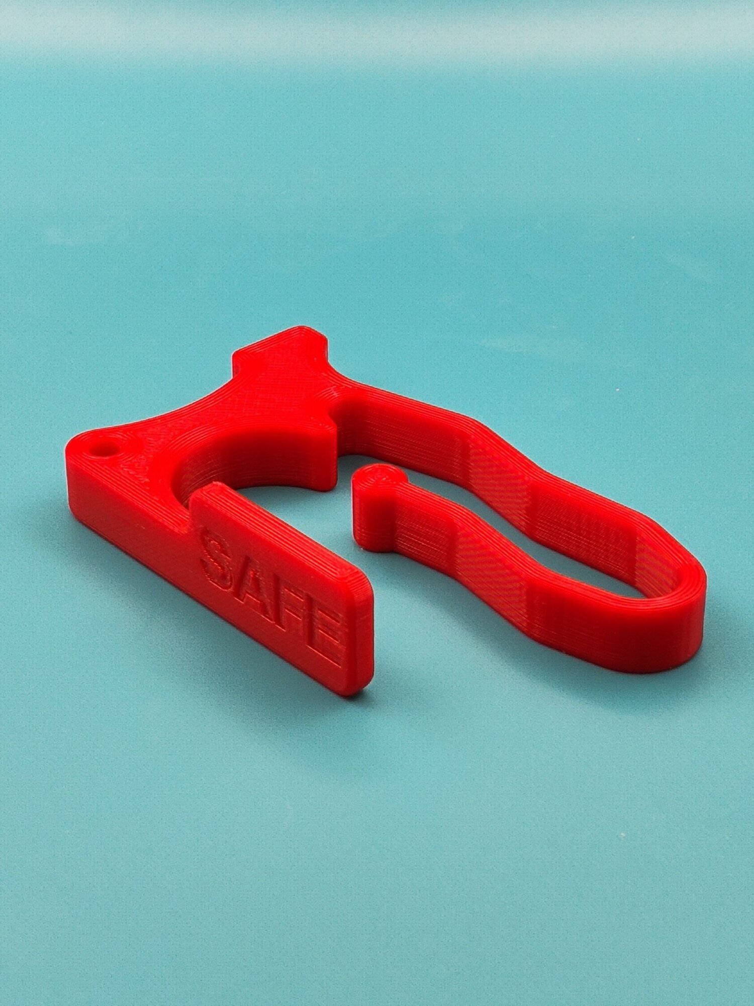 Флажок безопасности для гладкоствольного оружия