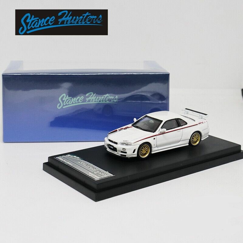 Машинка коллекционная Stance Hunters Nissan Skyline R34 GTR Z Tune Nismo Livery white 64SHC0063