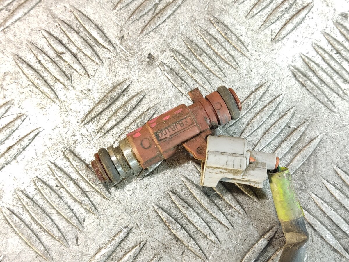 Форсунка двигателя NISSAN Almera N16 166005L300