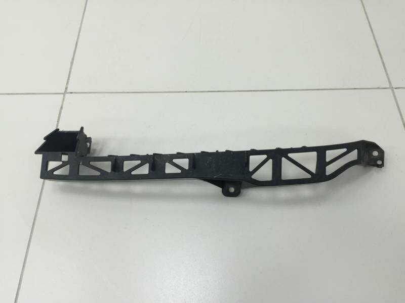 Кронштейн фар левый Mazda 3 BK 2002-2009