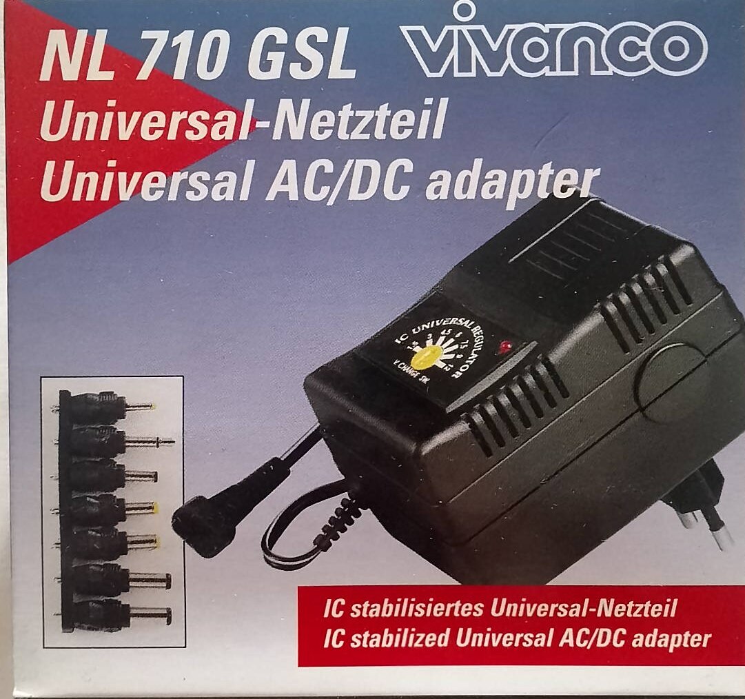 Универсальный AC/DC блок питания адаптер NL 710 GSL
