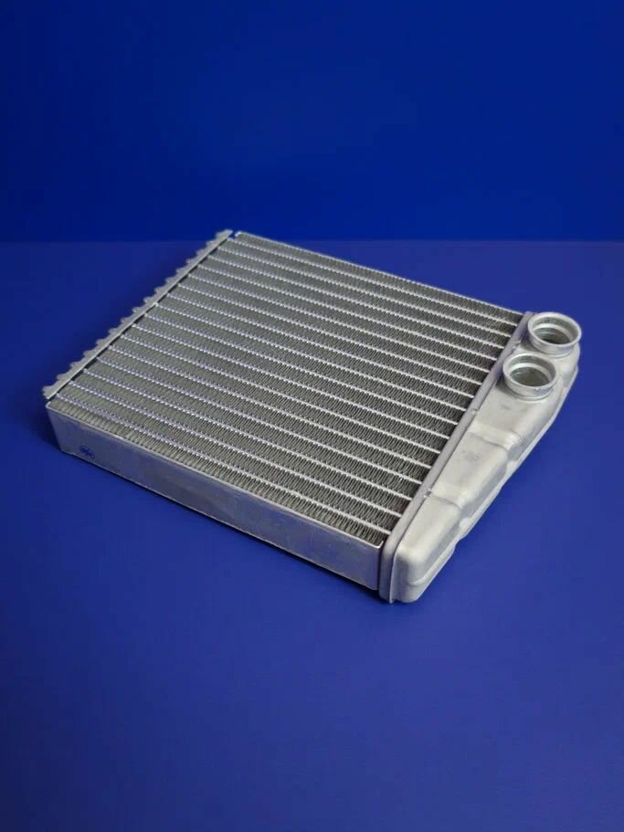 Радиатор печки Фольксваген Пассат 2005-2010гг. Радиатор отопителя Passat