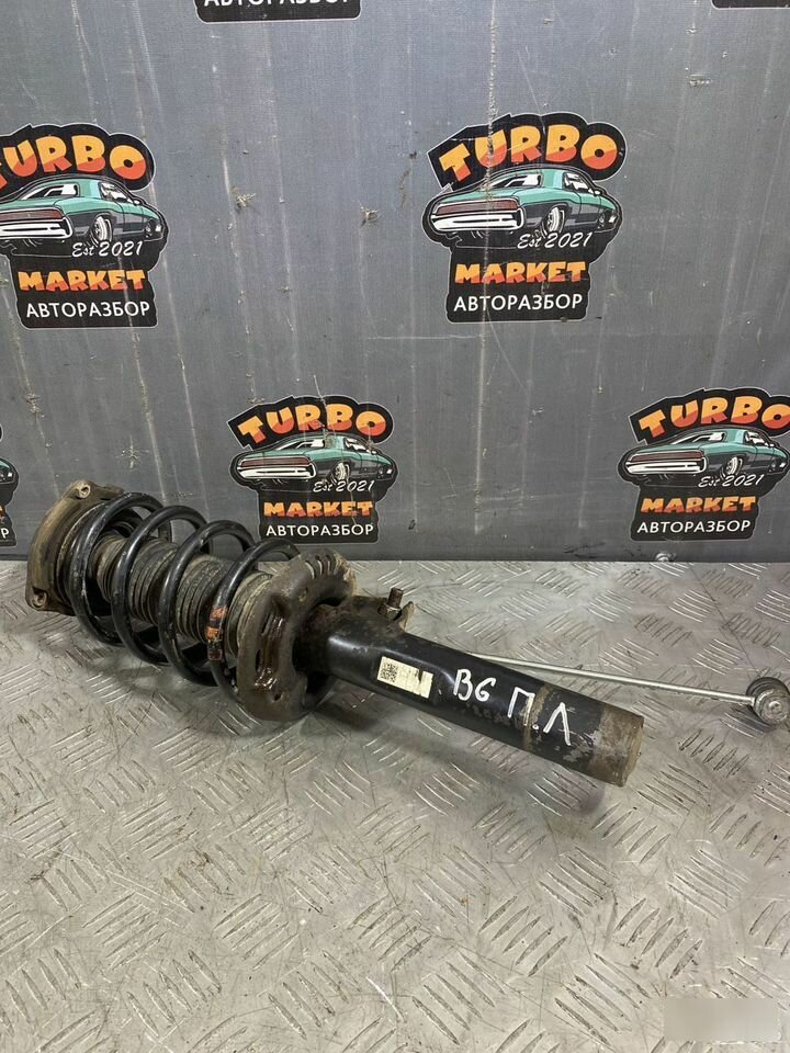 Стойка передняя левая Volkswagen Passat B6
