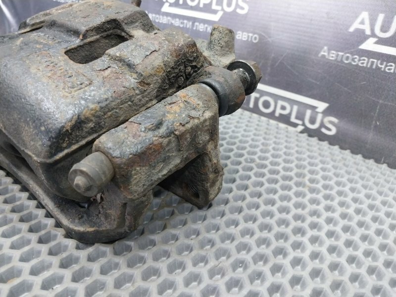 Суппорт тормозной Правый Передний Mazda CX7 2006-2009 (2.3 L3-VDT) Б/У с пробегом Арт. 16342 — фото 1