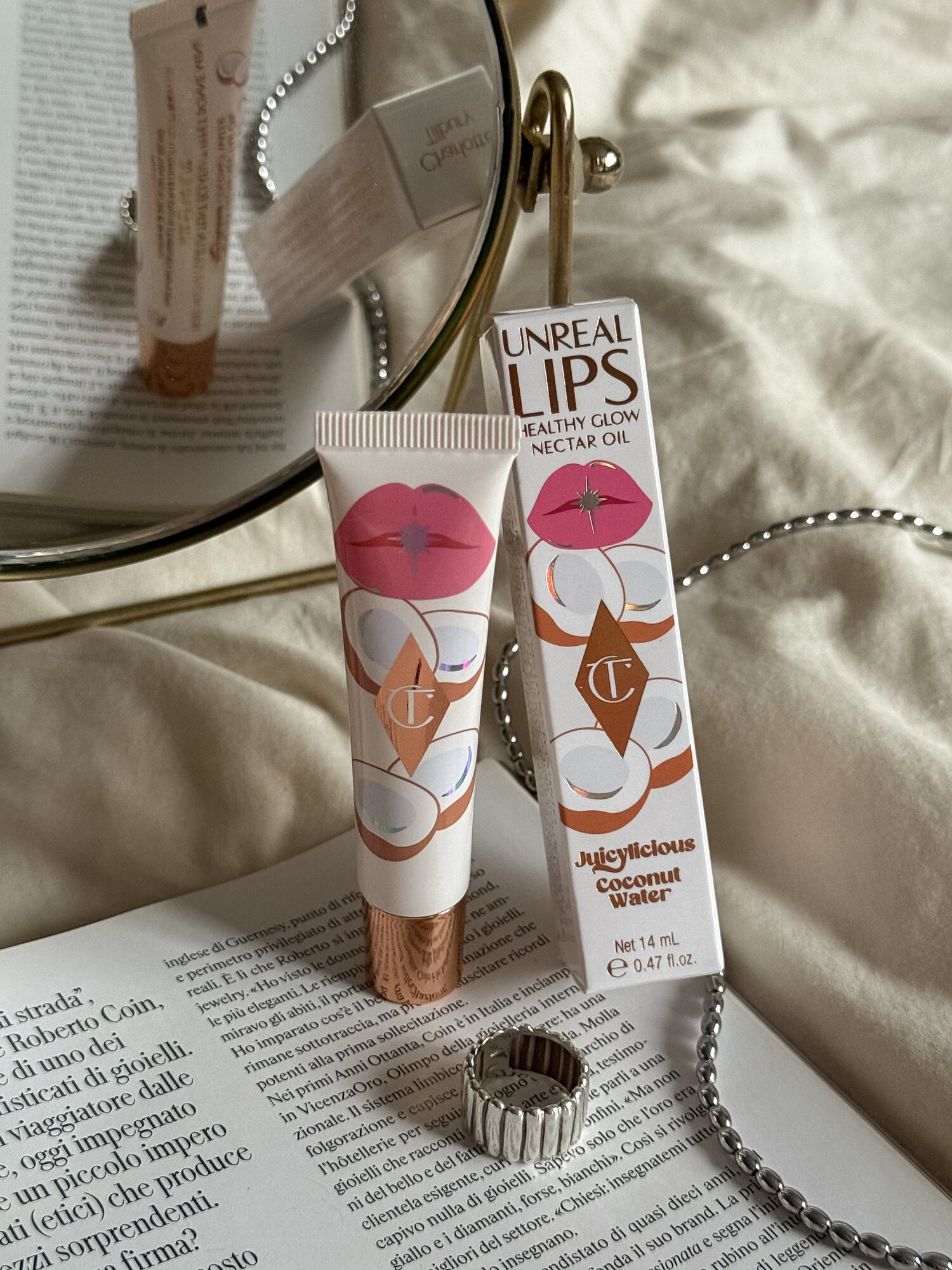 Charlotte Tilbury Масло для губ Unreal Lips Healthy Glow Nectar Lip Oil (Juicylicious Coconut Water) 14 мл