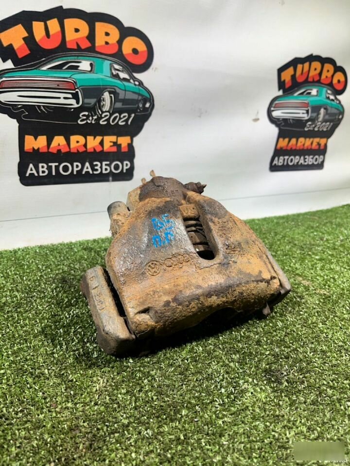 Суппорт тормозной передний правый Volkswagen