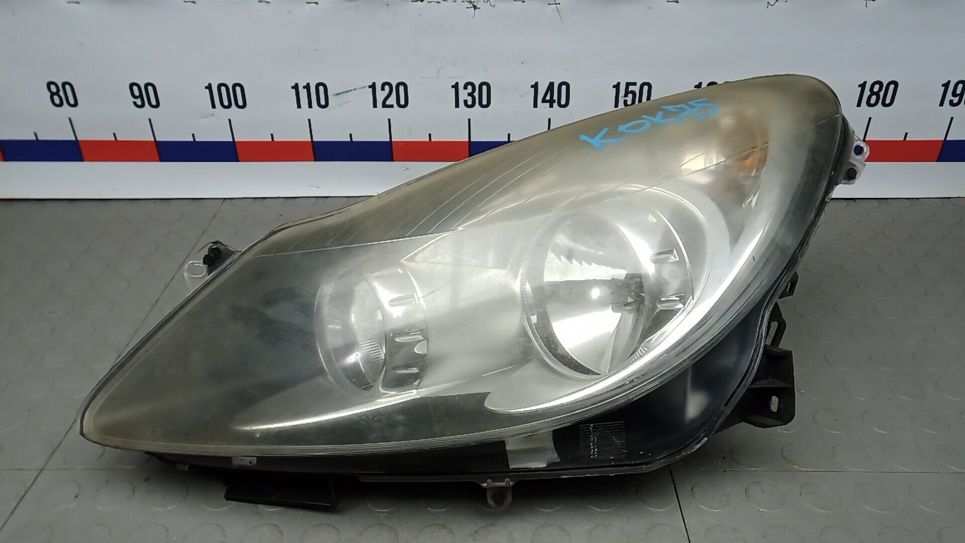 Фара левая OPEL CORSA D