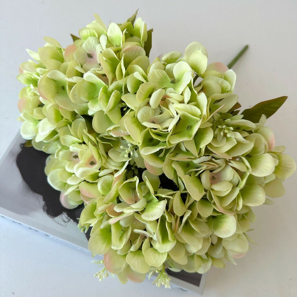 Artistic hydrangea silk flower display for wedding photography home decor, green