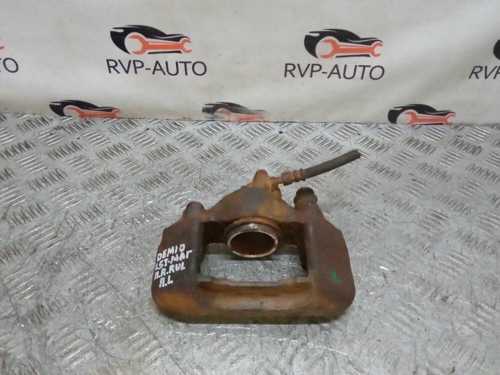 Суппорт передний левый Mazda Demio DW 1996-2003