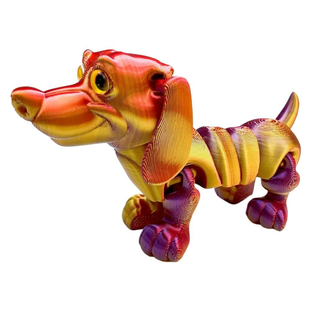 Игрушка-фигурка таксы — фото 1