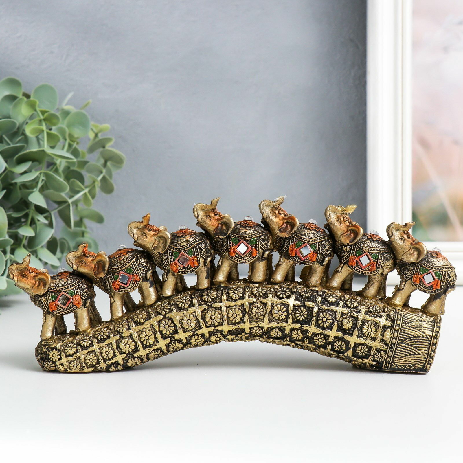 Фигура полистоун "Семь слонов на бивне с цветами", под бронзу, 21x4x9.8 см