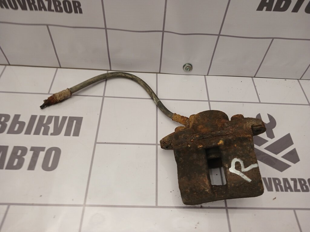 Суппорт передний правый Renault Logan 2005-2014