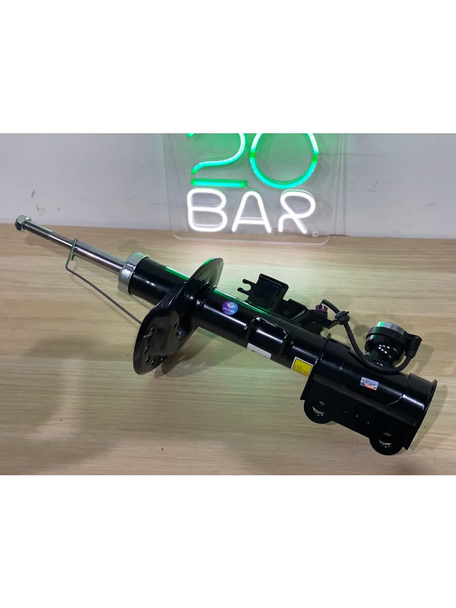 Амортизатор передний левый Cadillac SRX 2010-2016