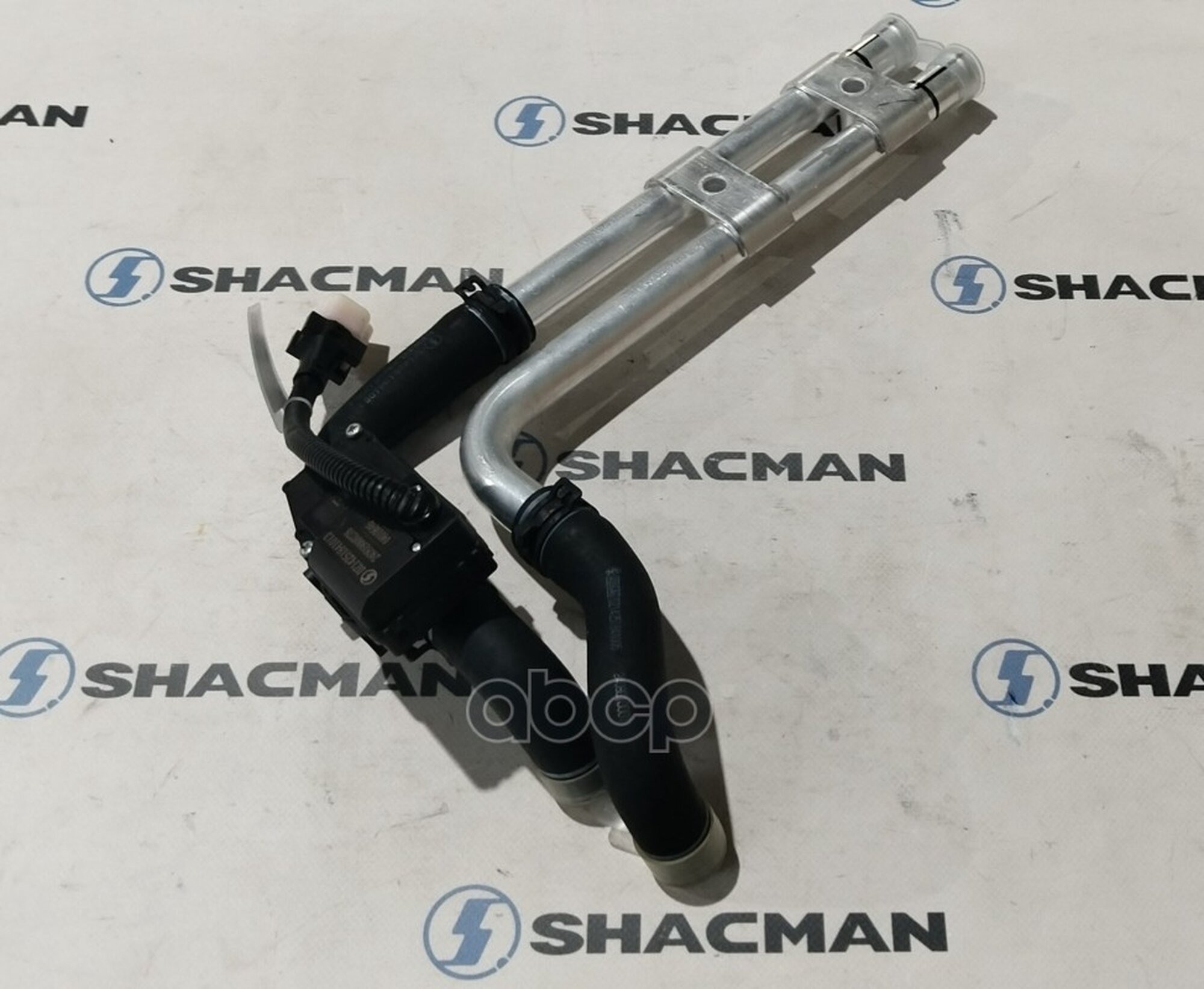 Трубки отопителя в сборе с краном печки SHACMAN X3000 оригинал Shacman арт. DZ14251841116