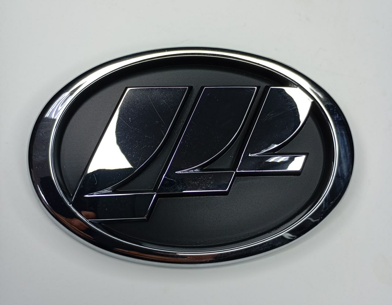 Эмблема крышки багажника Lifan X60 [1.8 16V 5MT внедорожник] S3921211